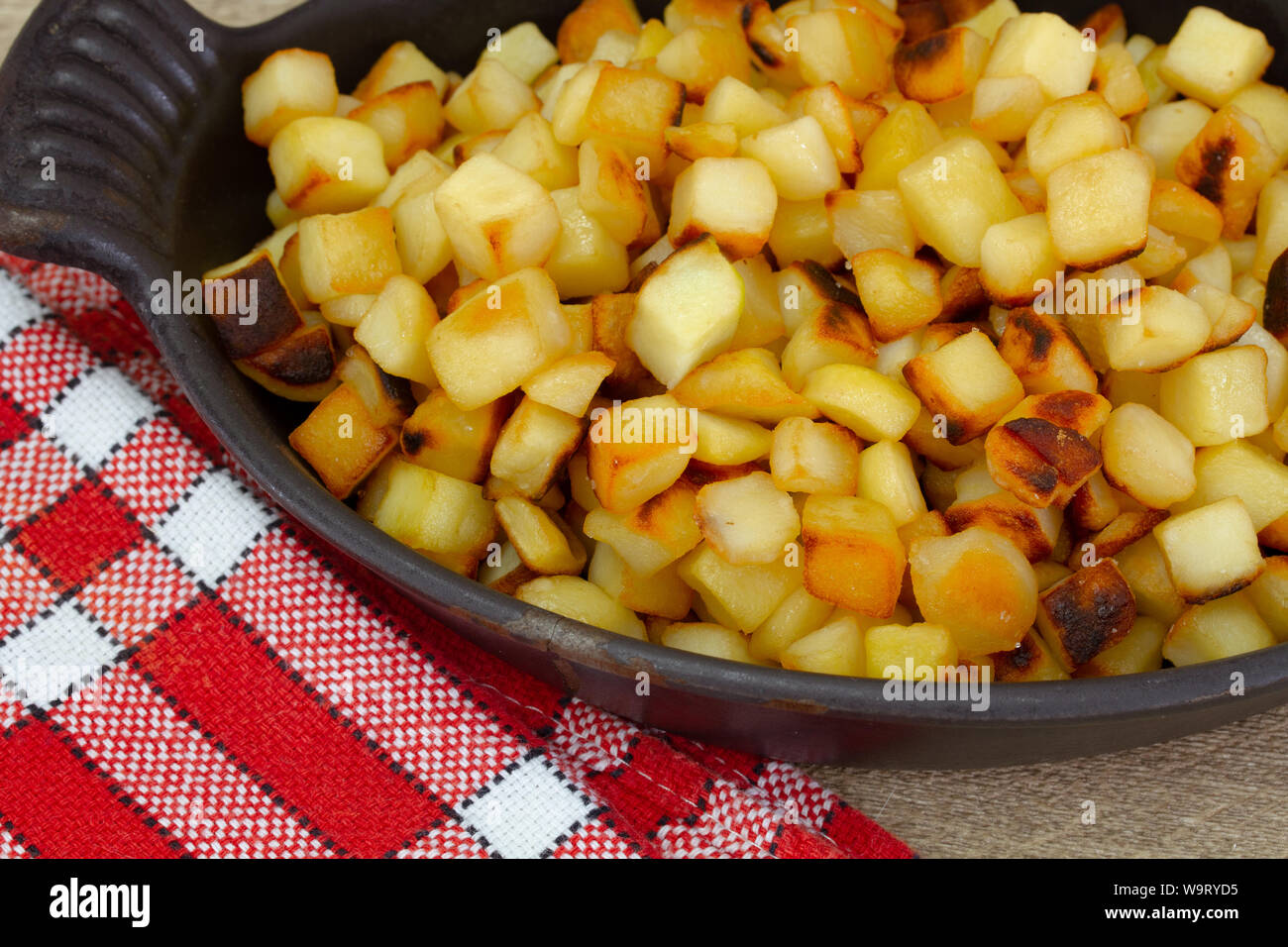 dish of hash browns on a table Stock Photo - Alamy
