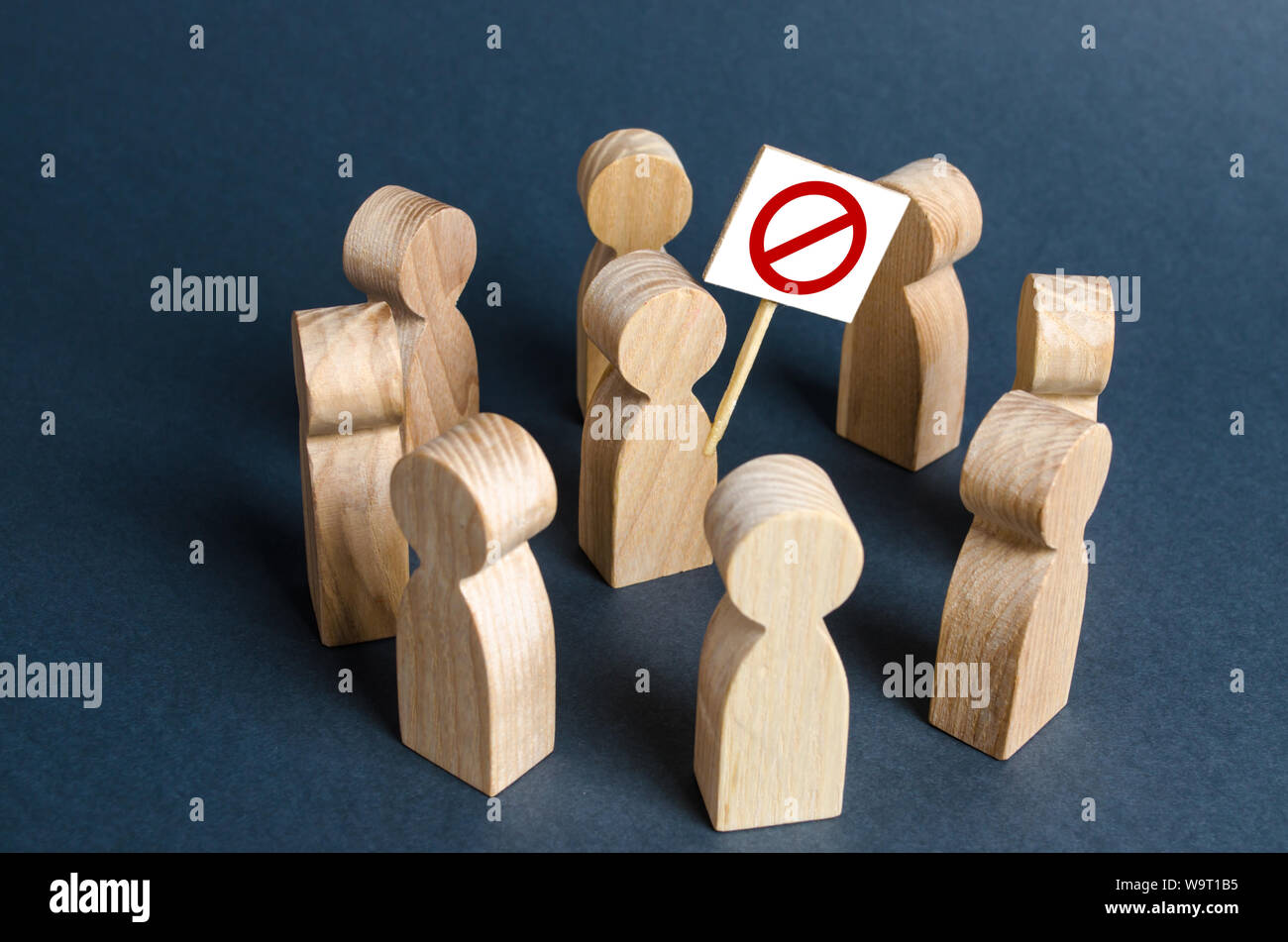 People surround a man with a poster. Agitation, drawing public ...