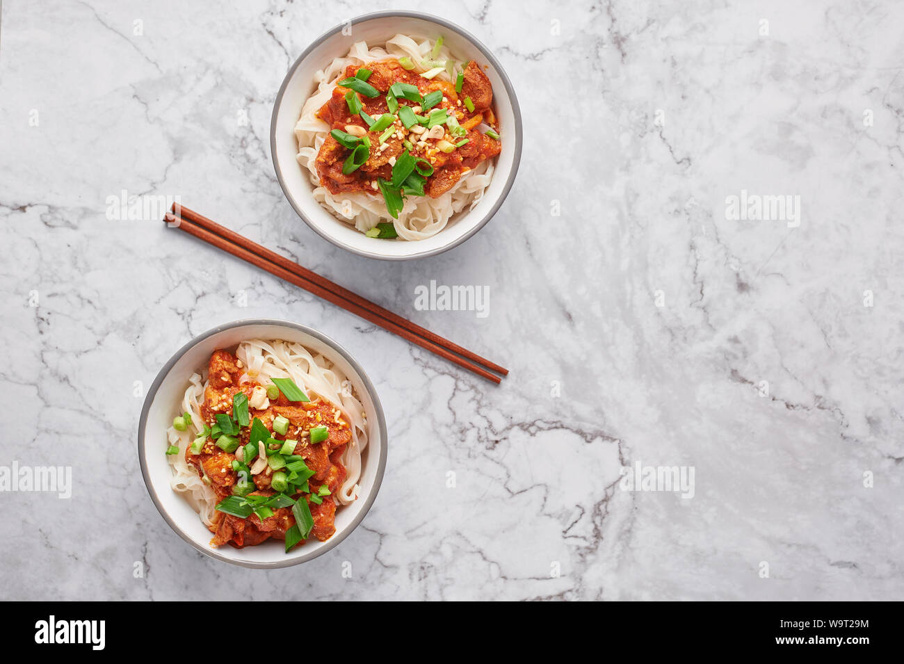 shan noodles with chopsticks at white marble tabletop. burmese cuisine ...