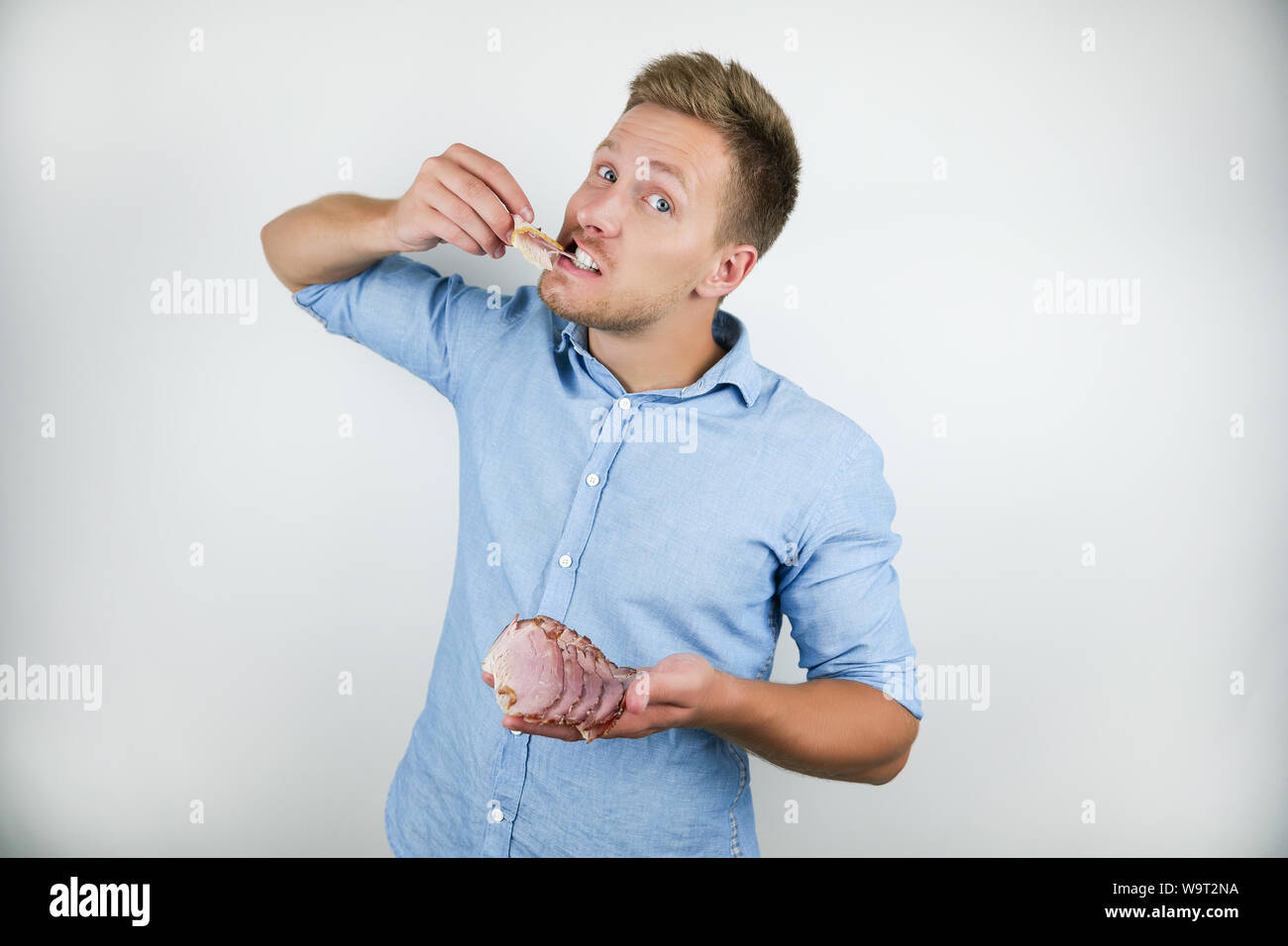 Man eats piece meat hi-res stock photography and images - Alamy