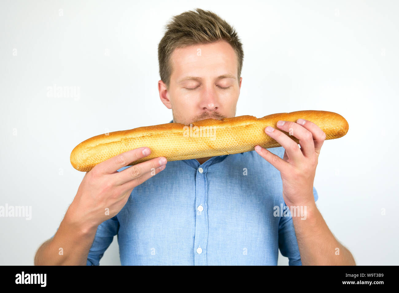 Man smelling bread hi-res stock photography and images - Alamy