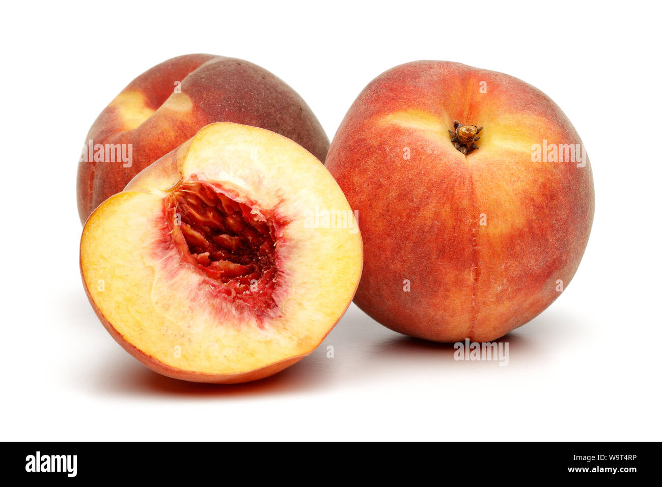 Whole and sliced peach fruits isolated on white background Stock Photo ...