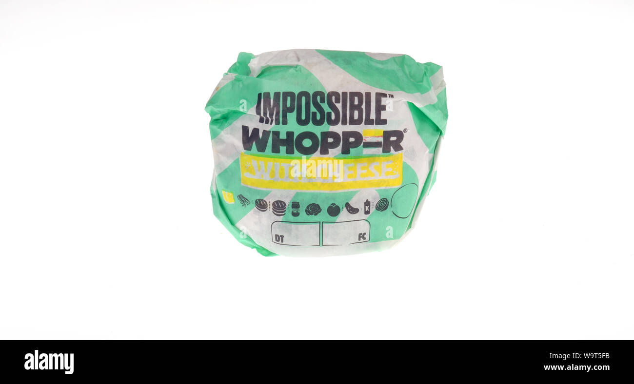 Burger King Impossible Whopper with cheese in wrapper Stock Photo - Alamy