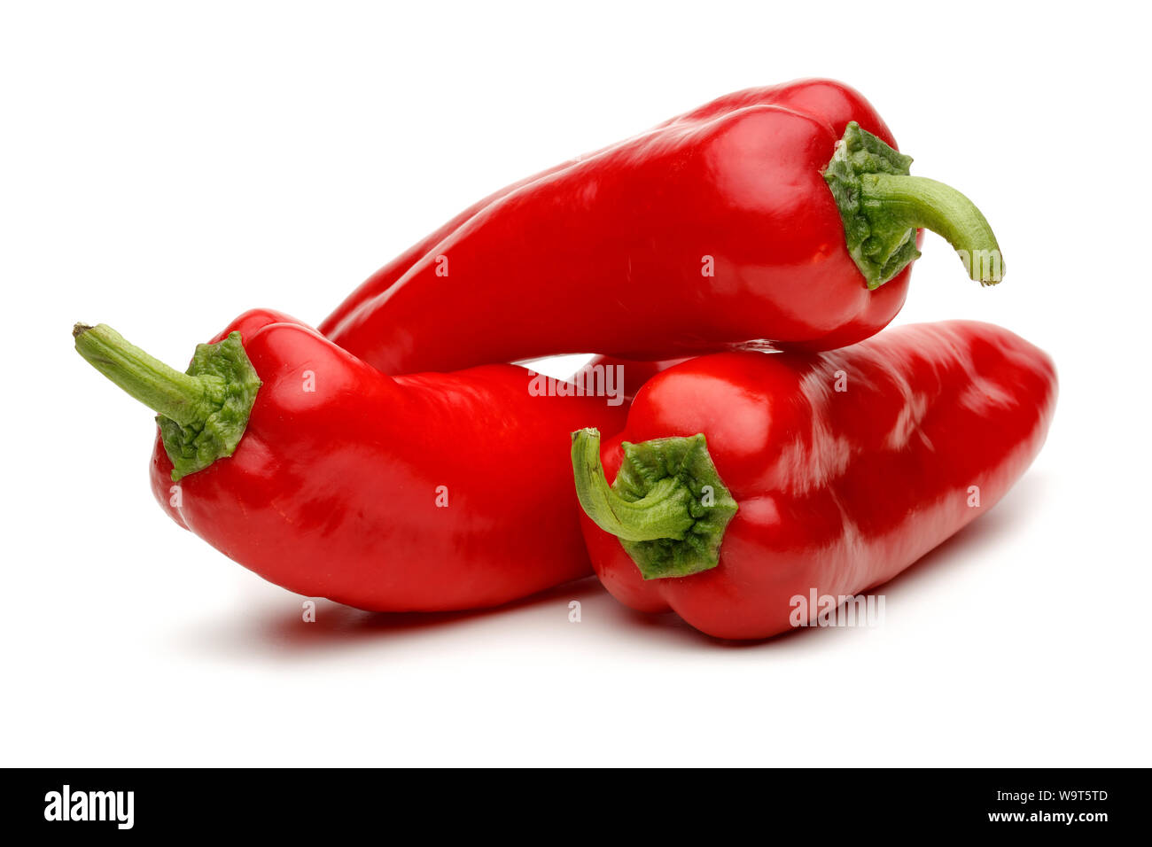 Fresh red peppers isolated on white background Stock Photo - Alamy