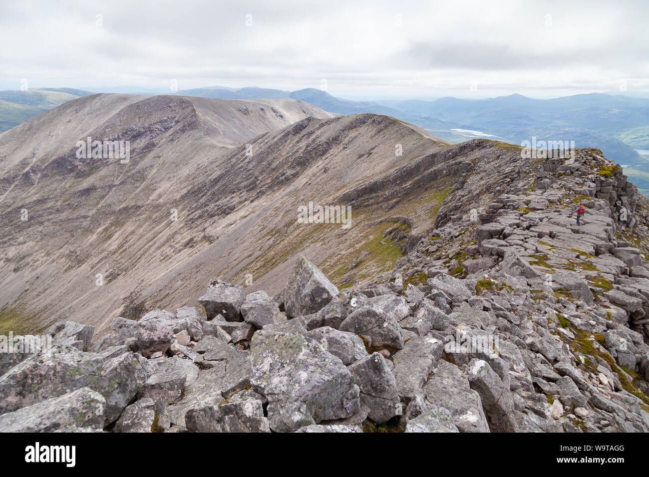 A walker on the ridge of Arkle (the summit is behind the camera ...
