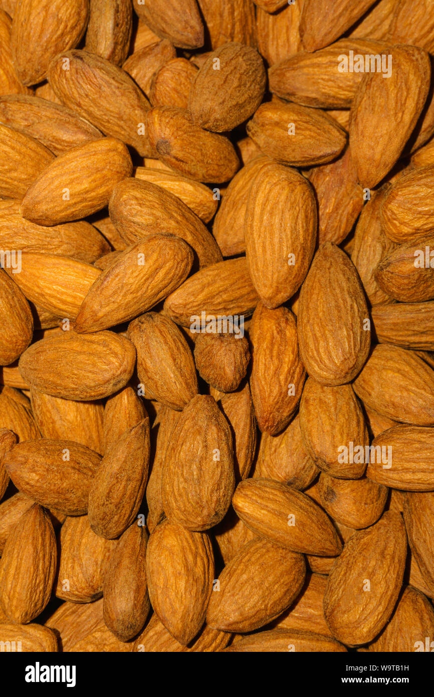 background - natural large shelled almond nuts Stock Photo - Alamy