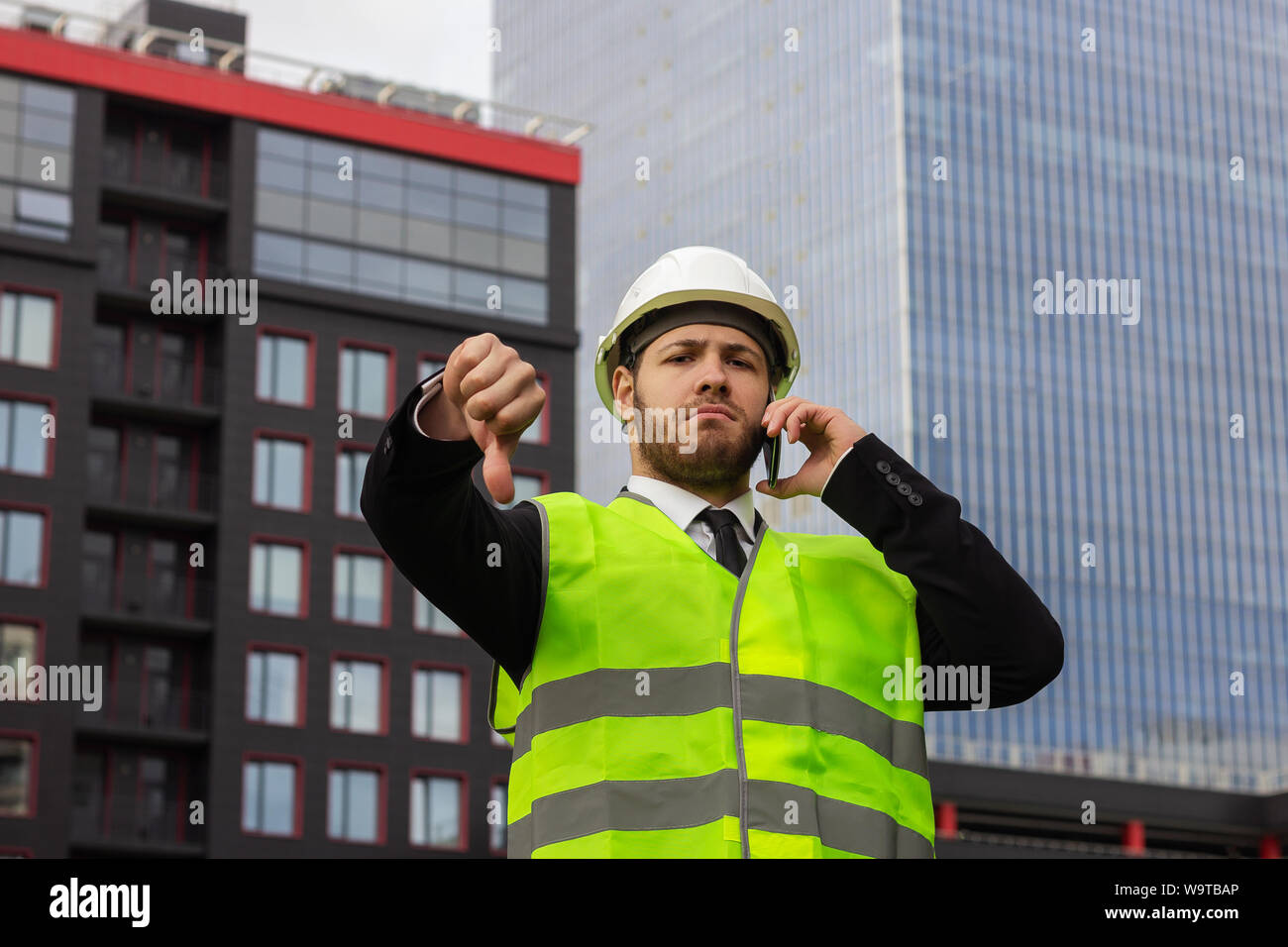 Dislike builder dissatisfied with work unhappy profession Stock Photo ...