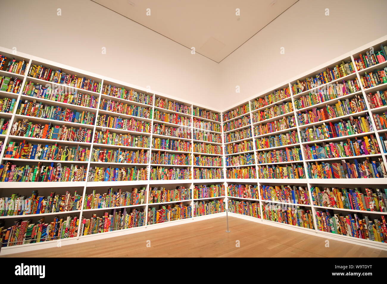 Book shelf display at Tate modern museum London UK Stock Photo - Alamy