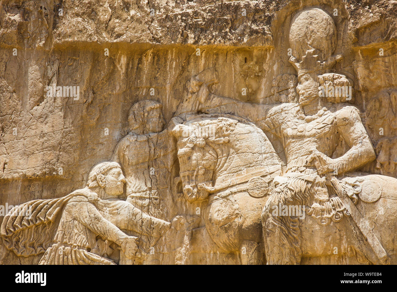 The triumph of Shapur I relief Stock Photo - Alamy