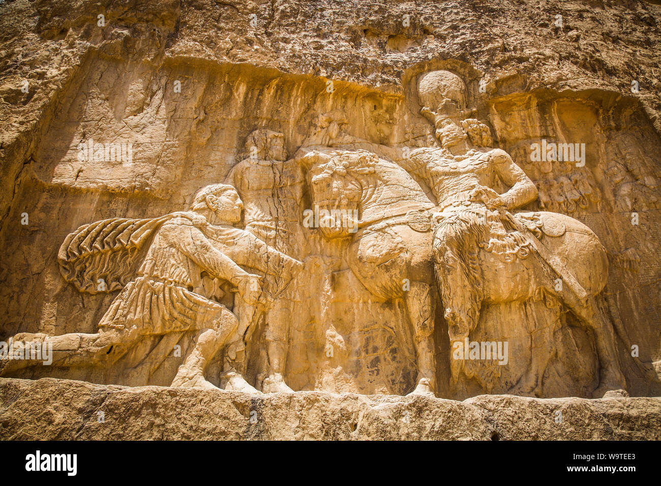 The triumph of Shapur I relief Stock Photo - Alamy