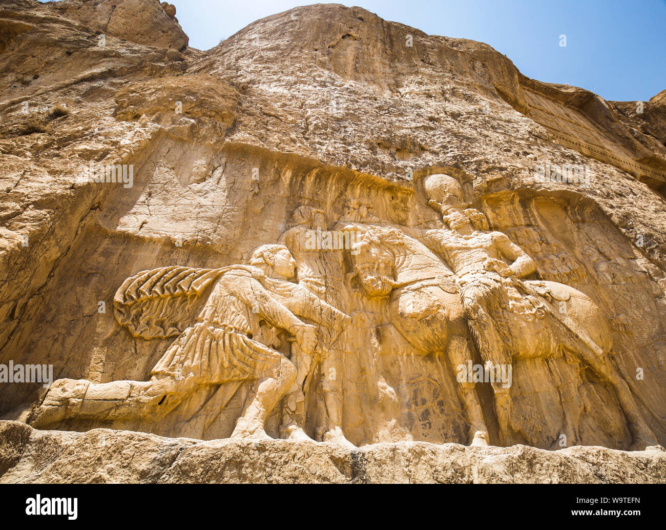 The triumph of Shapur I relief Stock Photo - Alamy