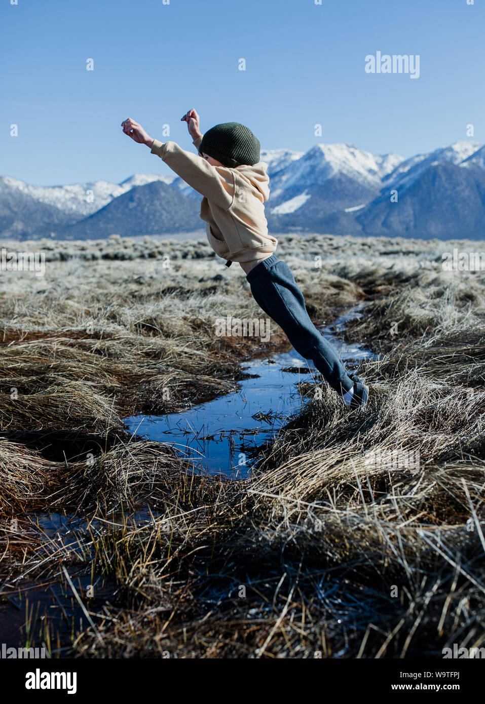 Boy jumping into a river hi-res stock photography and images - Alamy