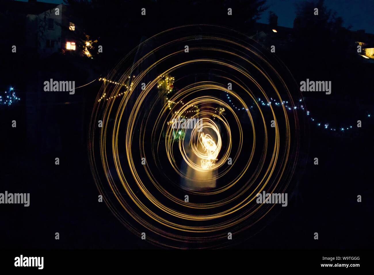 Long exposure shot of circling round light trails - cool background or ...