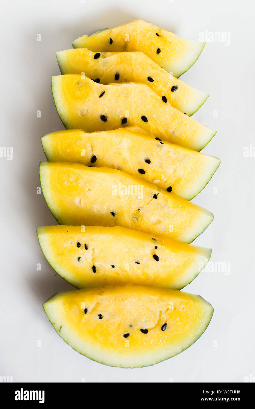 ripe yellow watermelon on white background, summer food Stock Photo - Alamy