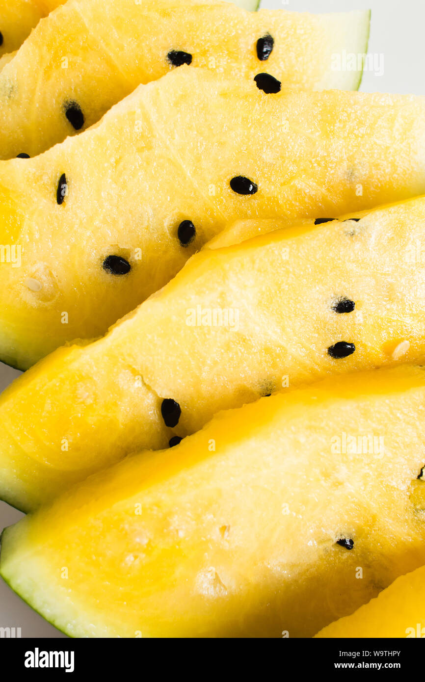 ripe yellow watermelon on white background, summer food Stock Photo - Alamy