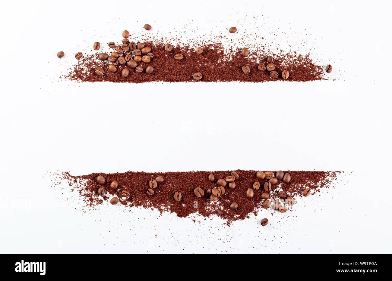 Ground coffee and beans on white background. Copy space for your text ...