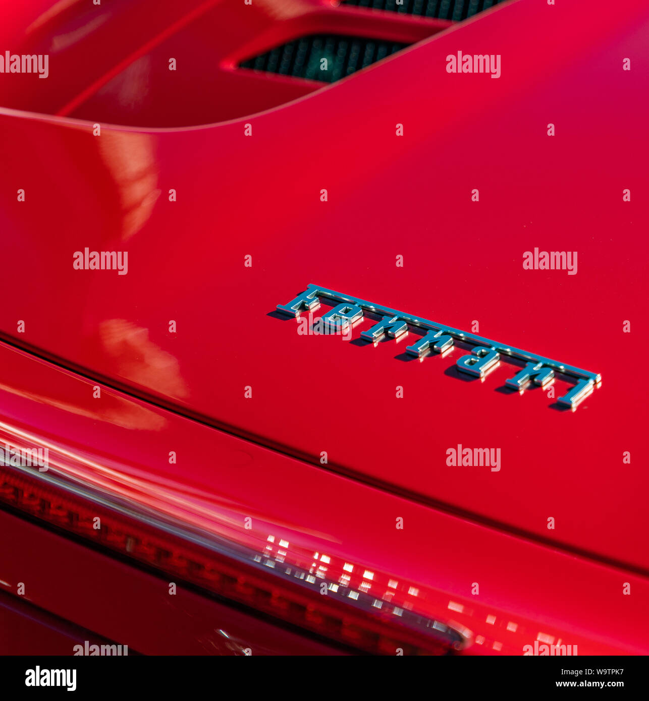 A picture of the Ferrari logo on the back of a car Stock Photo - Alamy