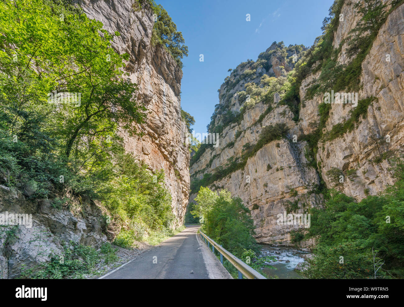Karst rock formations over Rio Veral in Hoz Binies section of Valle de ...