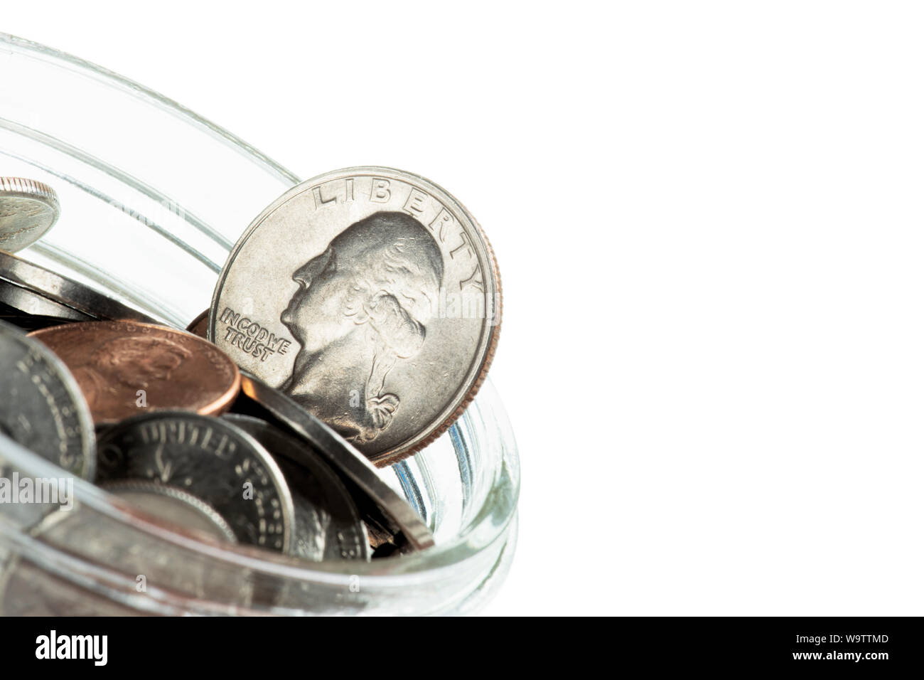 United States coins in a jar isolated on white background Stock Photo ...