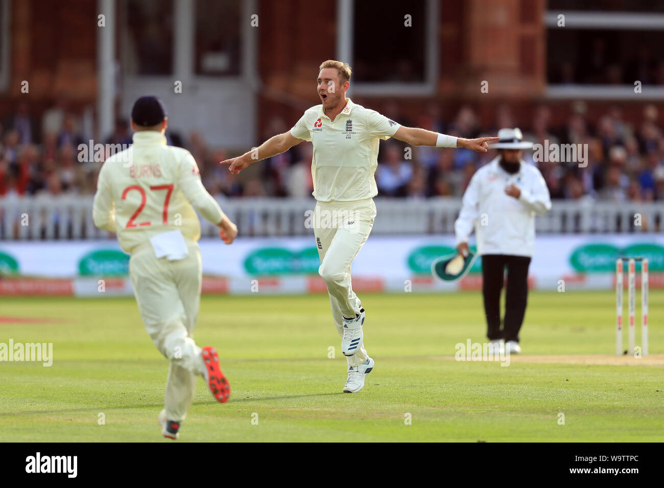 Englands stuart broad celebrates taking wicket australias david warner ...