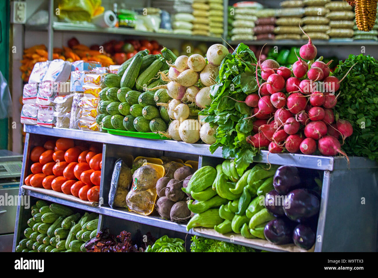Vegetable store at a Peruvian market Stock Photo - Alamy
