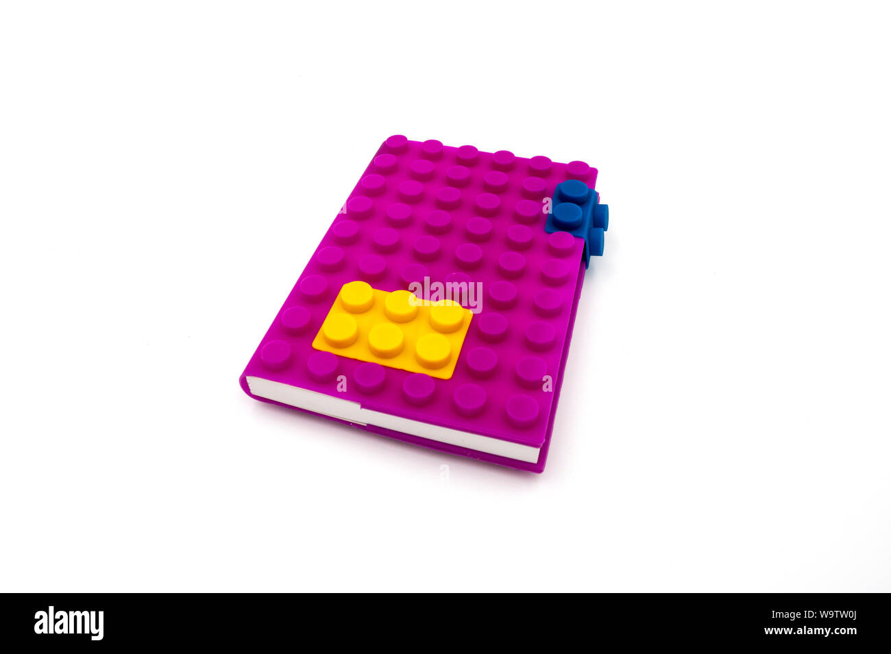 Creative purple color building blocks type notebook isolated on white ...