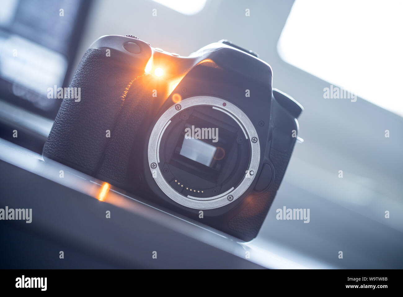 Professional reflex camera on a table, camera sensor Stock Photo - Alamy