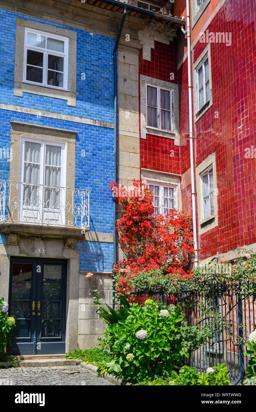 Trditional houses faced with brightly coloured tiles in the center of ...
