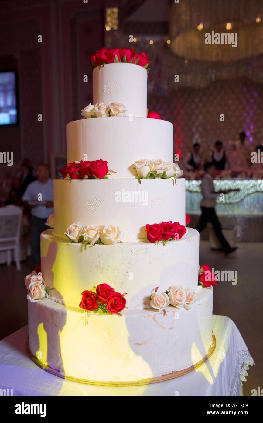 five-layer cake. Gourmet tiered wedding cake at wedding reception .5 ...