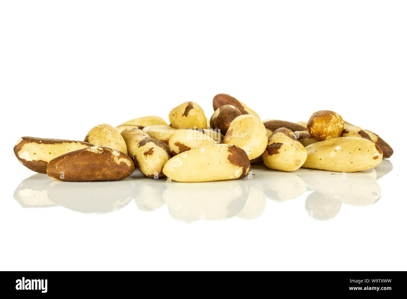 Lot of whole unshelled brazil nut stack isolated on white background ...