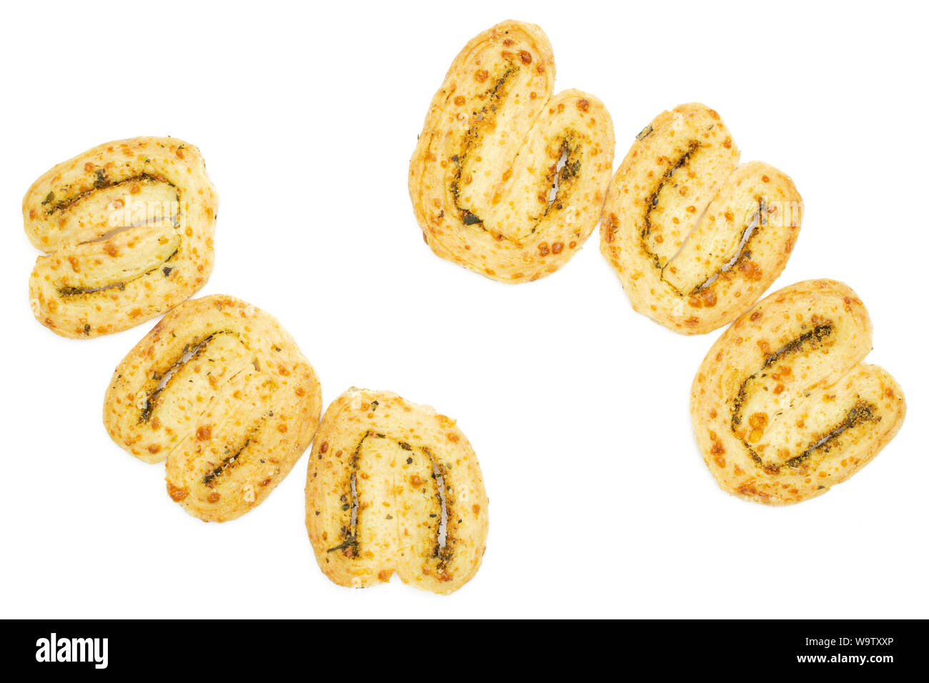 Group of six whole savory cheese palmier flatlay isolated on white ...