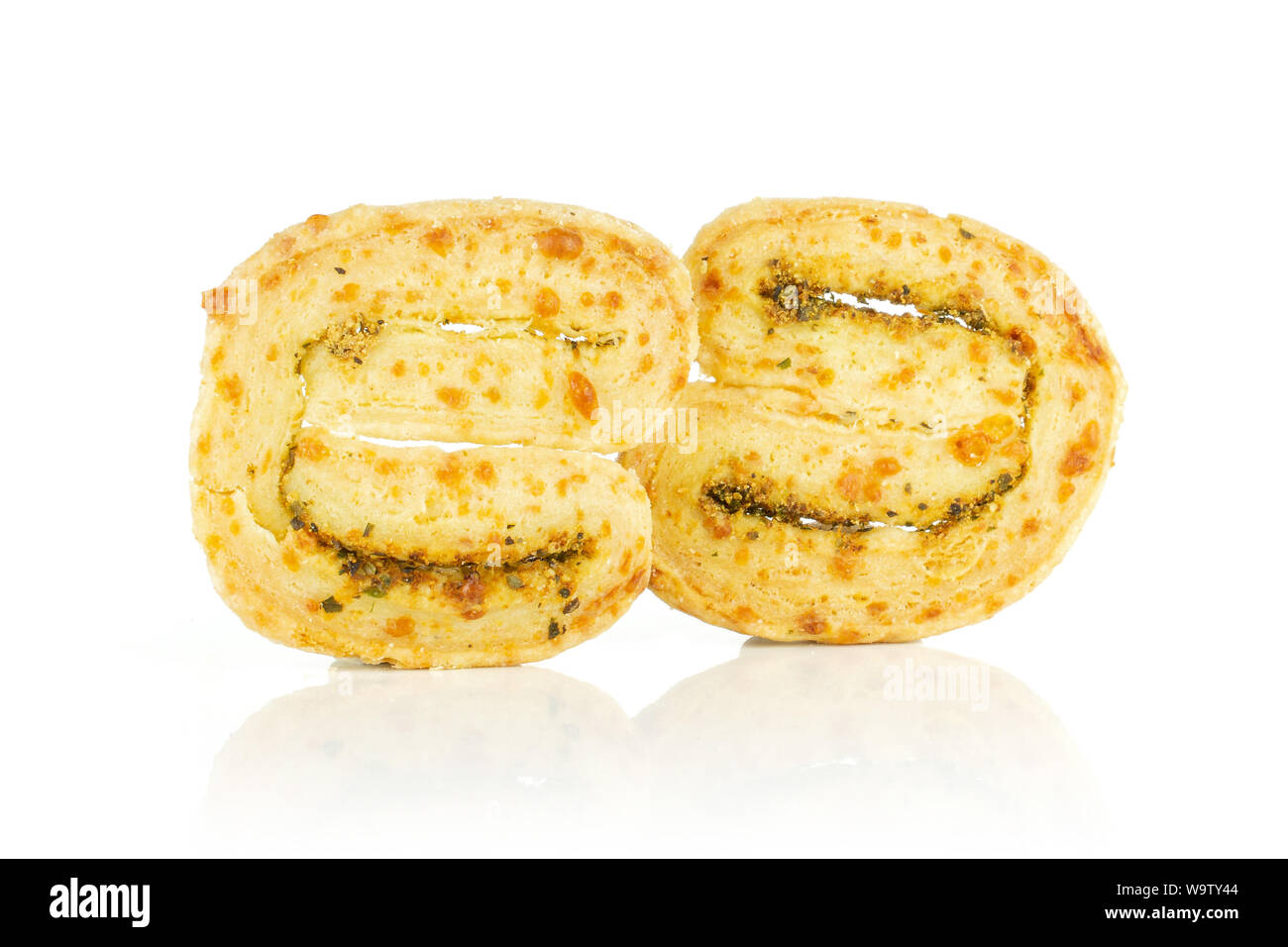 Group of two whole savory cheese palmier isolated on white background ...