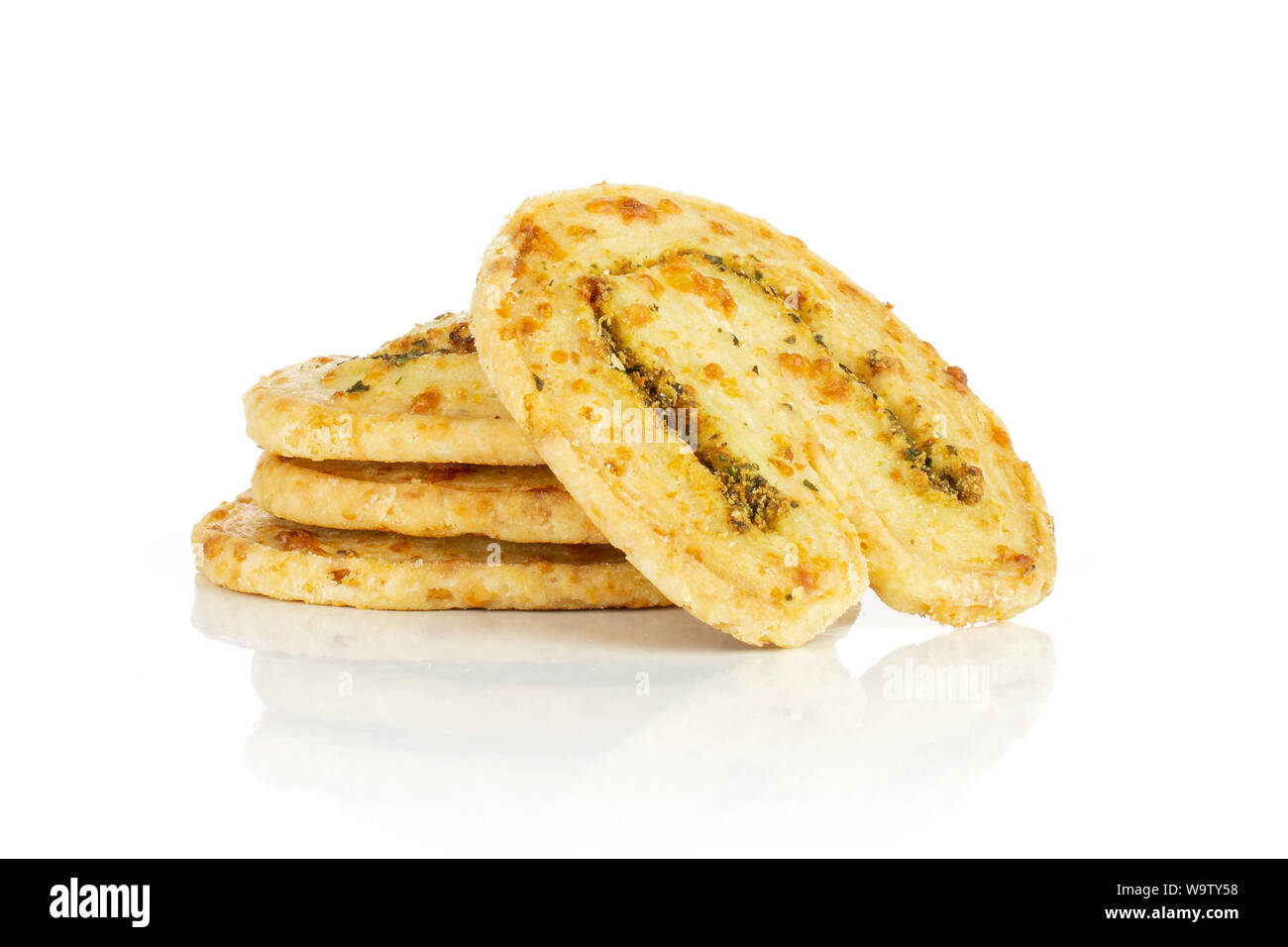 Group of four whole savory cheese palmier isolated on white background ...