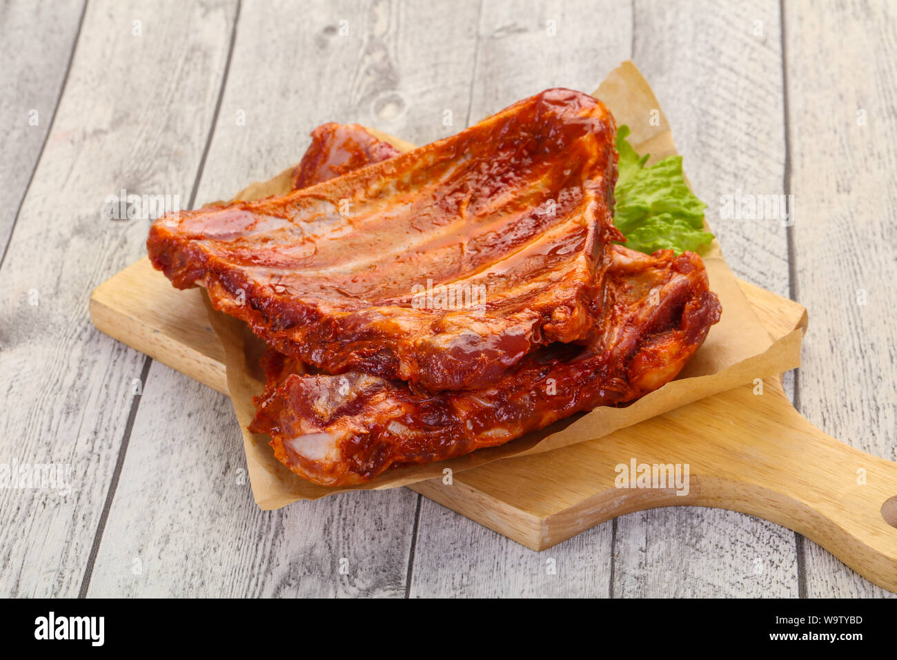 Raw marinated pork ribs ready for cooking Stock Photo - Alamy
