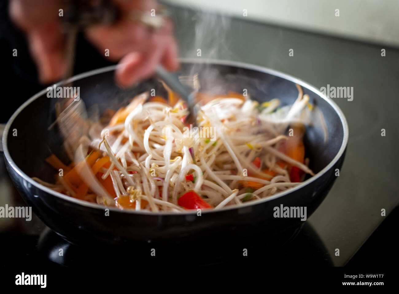 Preparing a stir fry Stock Photo - Alamy