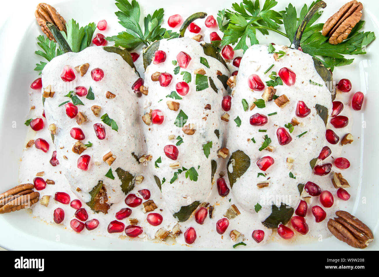 Chiles en nogada, a dish from Mexican cuisine Stock Photo - Alamy