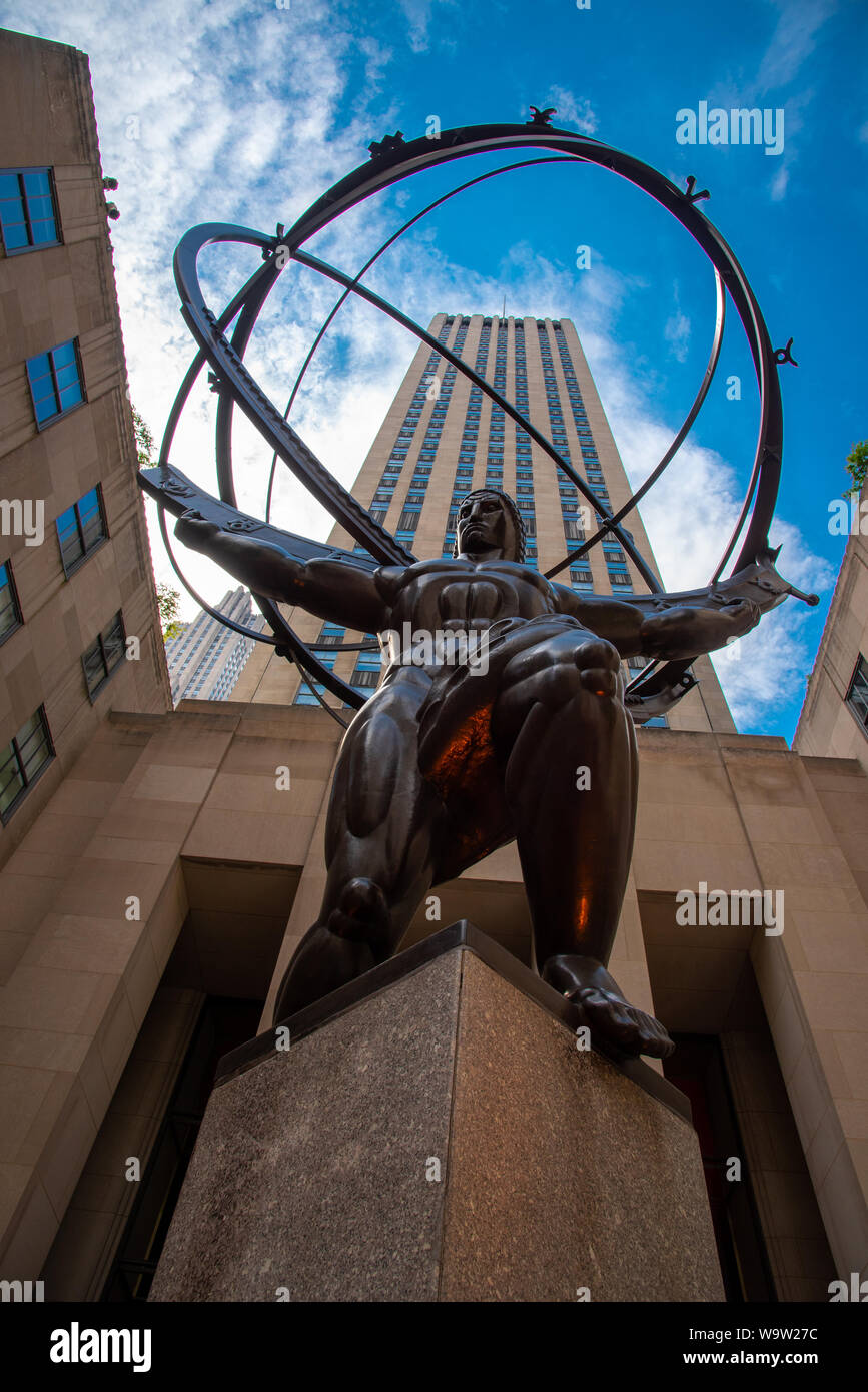 The statue of Atlas is located on the fifth avenue of NYC by the ...