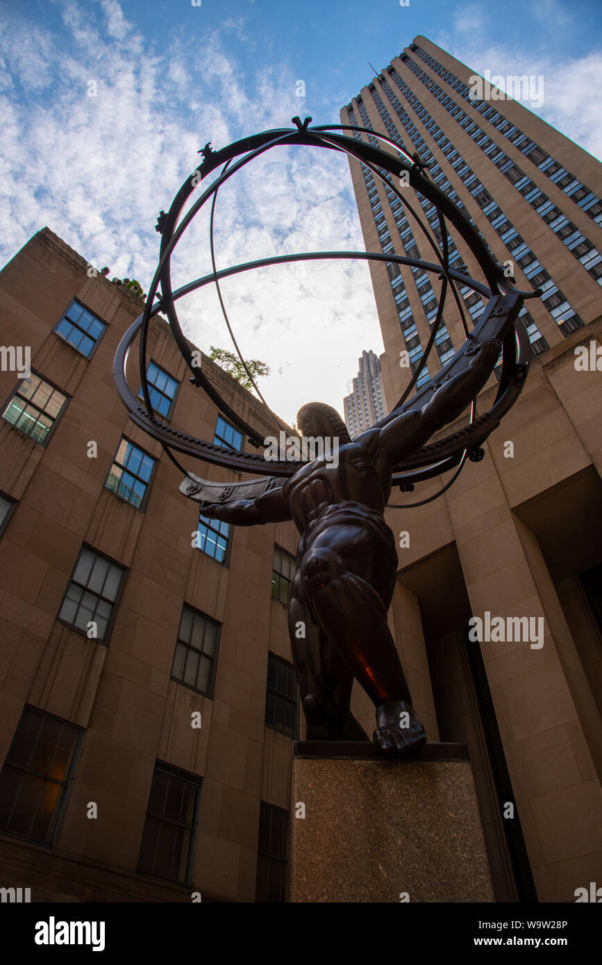 The statue of Atlas is located on the fifth avenue of NYC by the ...