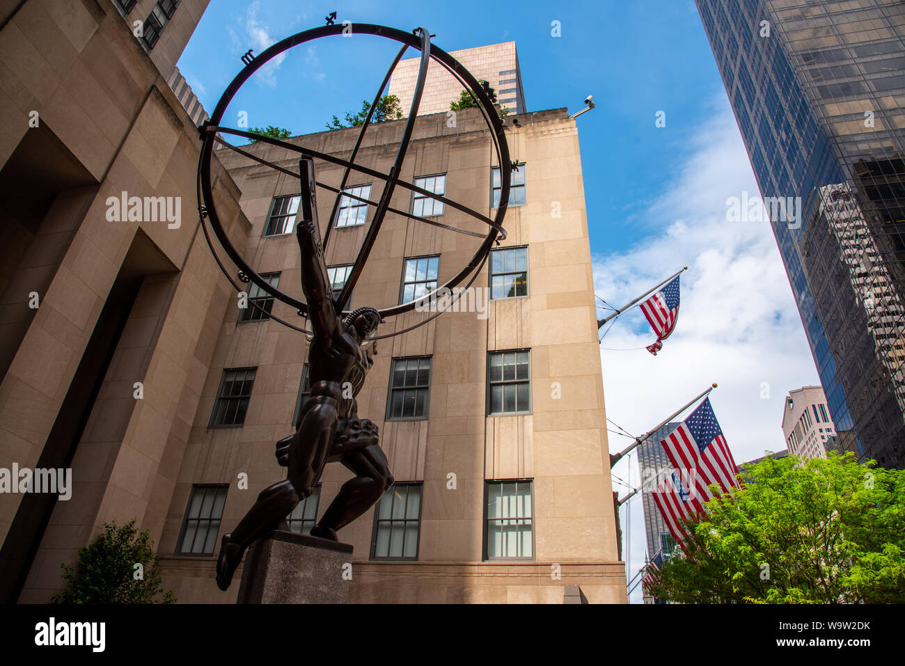 The statue of Atlas is located on the fifth avenue of NYC by the ...