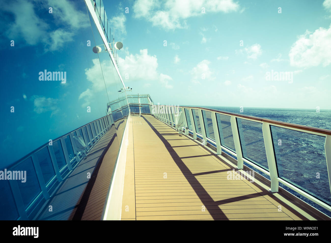 Cruise ship empty open deck with copy space, blue tone Stock Photo - Alamy