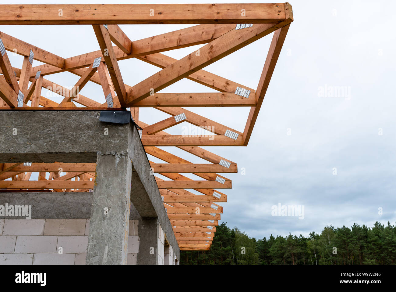 Roof trusses not covered with ceramic tile on a detached house under ...