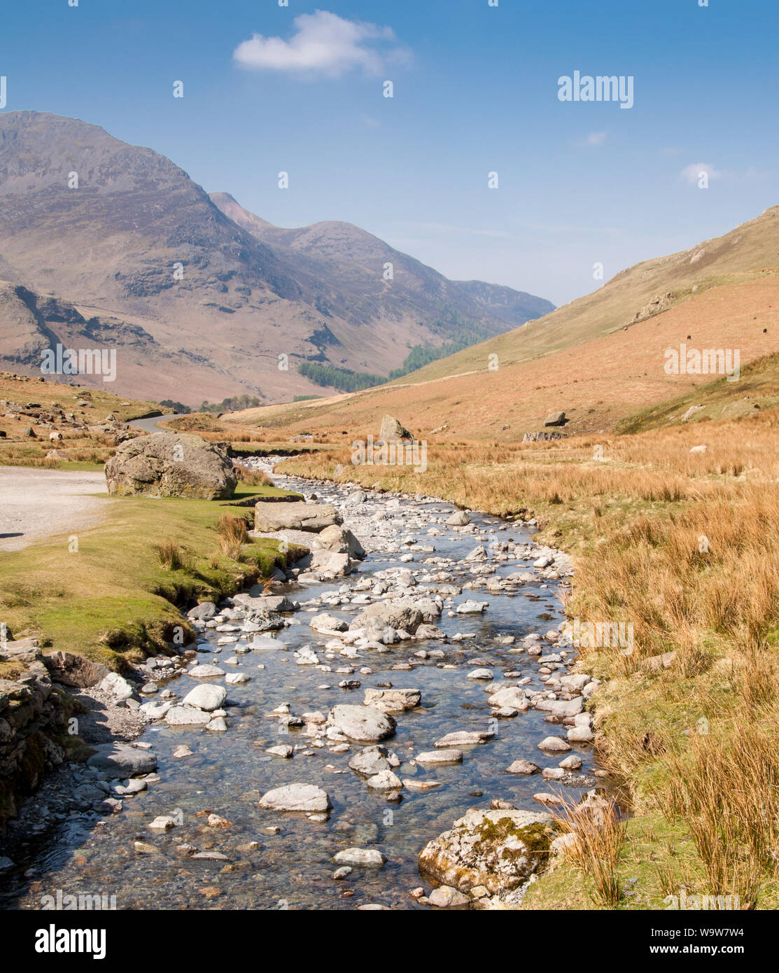 The Gatesgarthdale Beck, a small rocky mountain river, flows through a ...