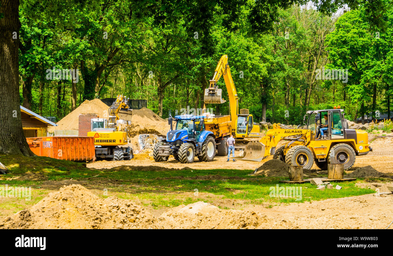 construction site with ground movement machinery at work, earthmoving ...