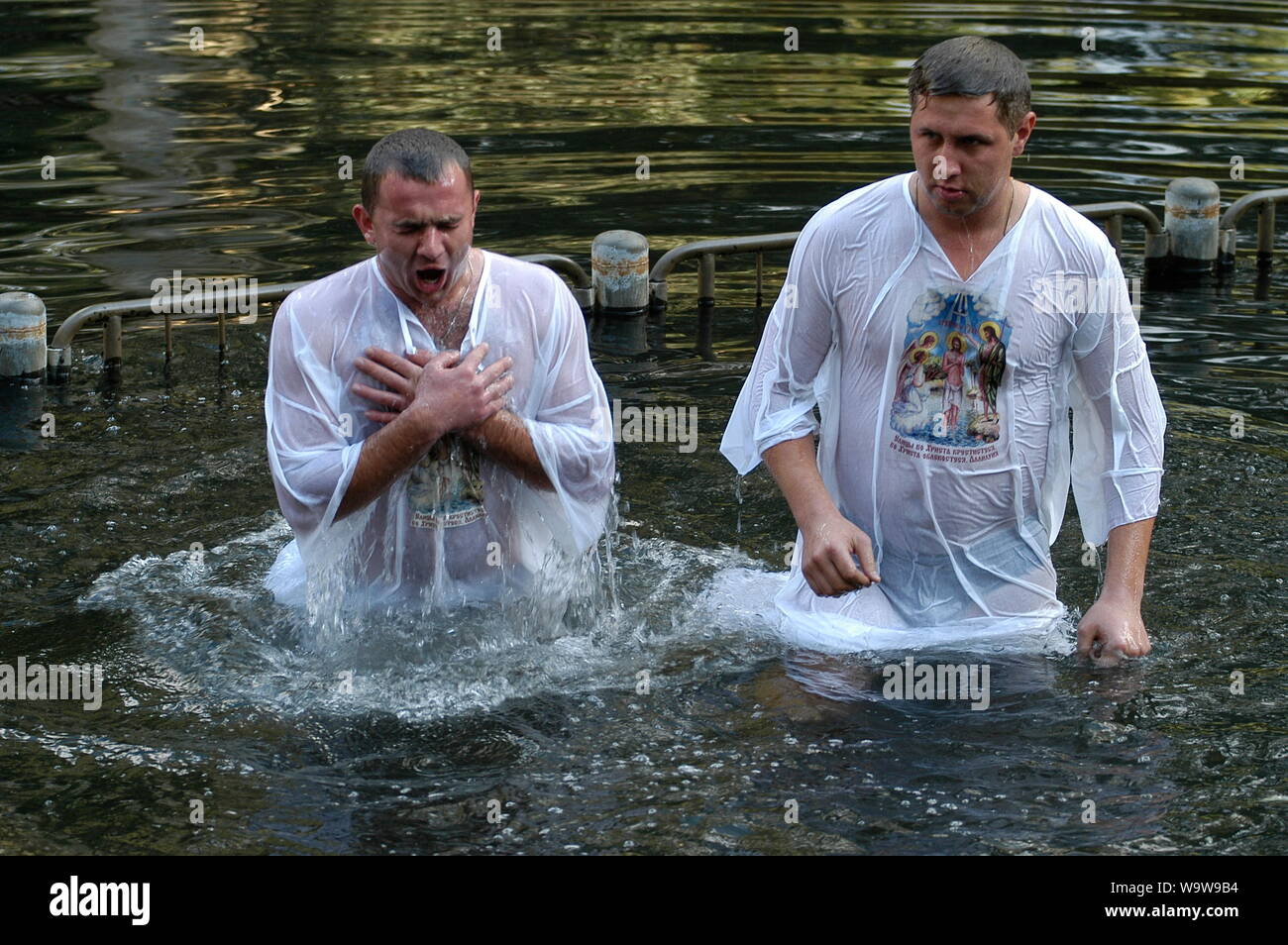 Epiphany, rite of baptism, Jordan River, Israel Stock Photo - Alamy