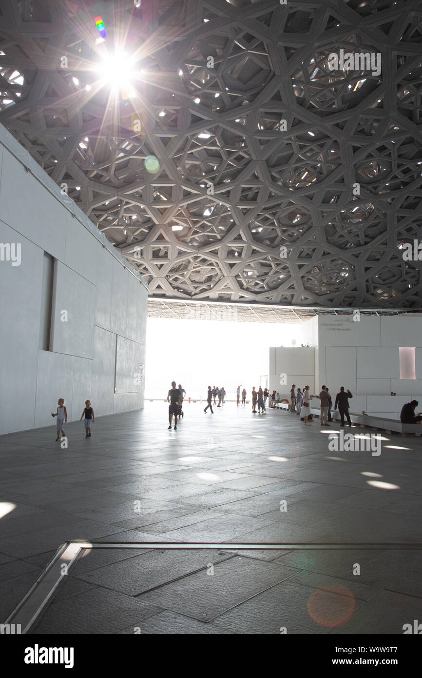 Visitors at the Louvre Abu Dhabi --- The Louvre Abu Dhabi is an art and ...