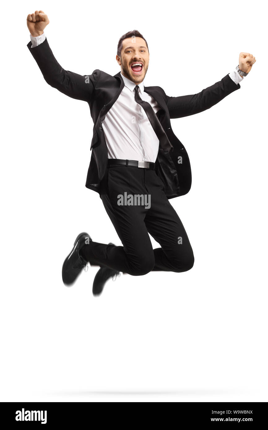 Full length shot of a young businessman jumping in excitement isolated ...