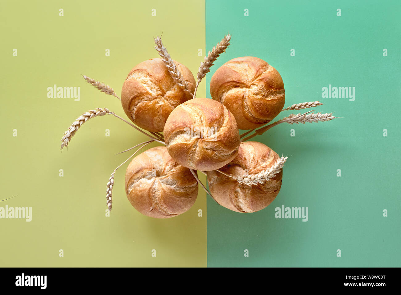 Group of crusty round bread rolls, known as Kaiser or Vienna rolls ...