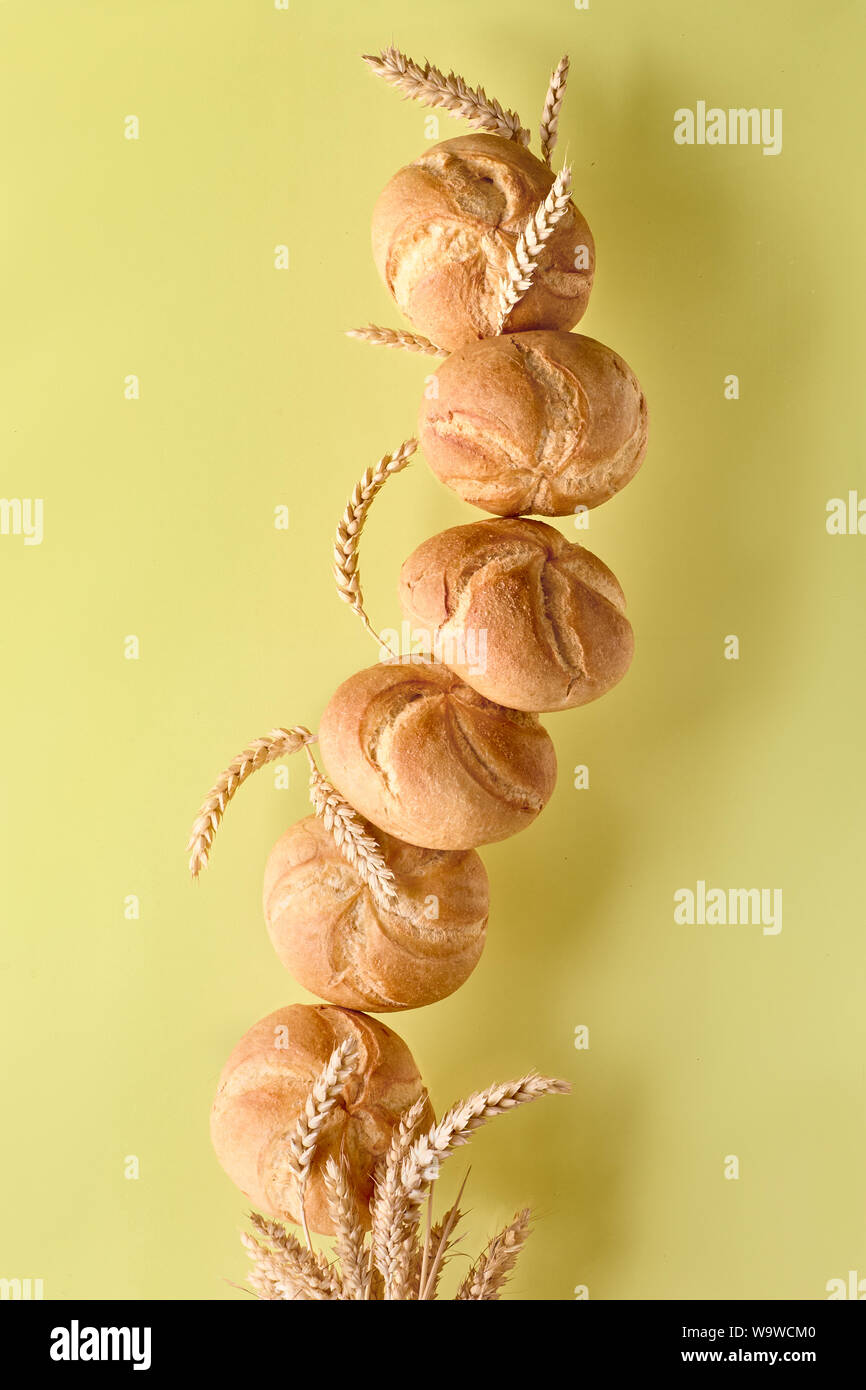 Pyramid of crusty round bread rolls, known as Kaiser or Vienna rolls ...
