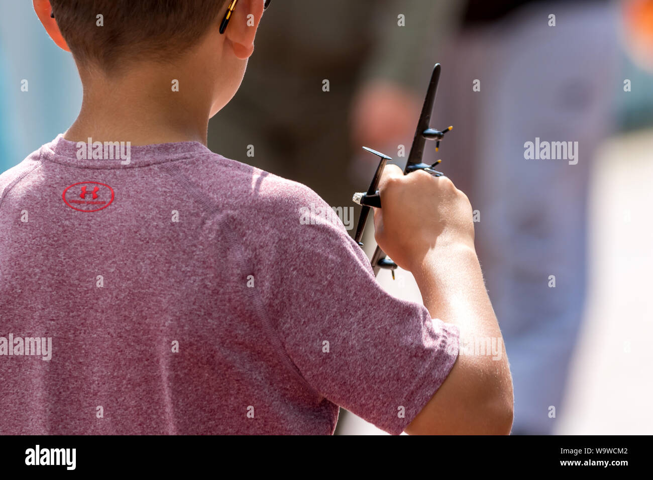 Eastbourne, UK. 15 Aug 2019. Young boy lost in play at the Eastbourne ...