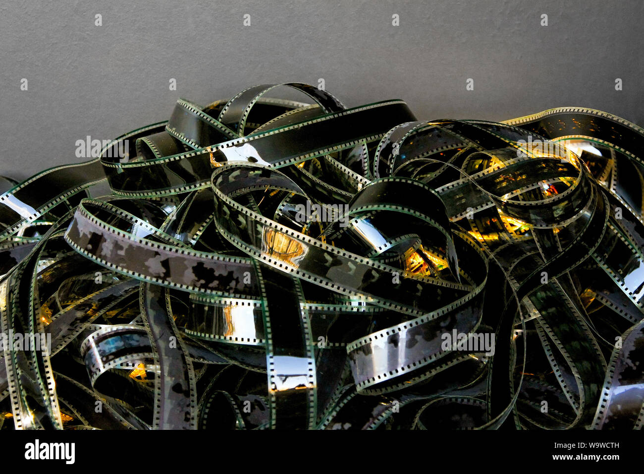 Big pile of old negative film rolls Stock Photo - Alamy